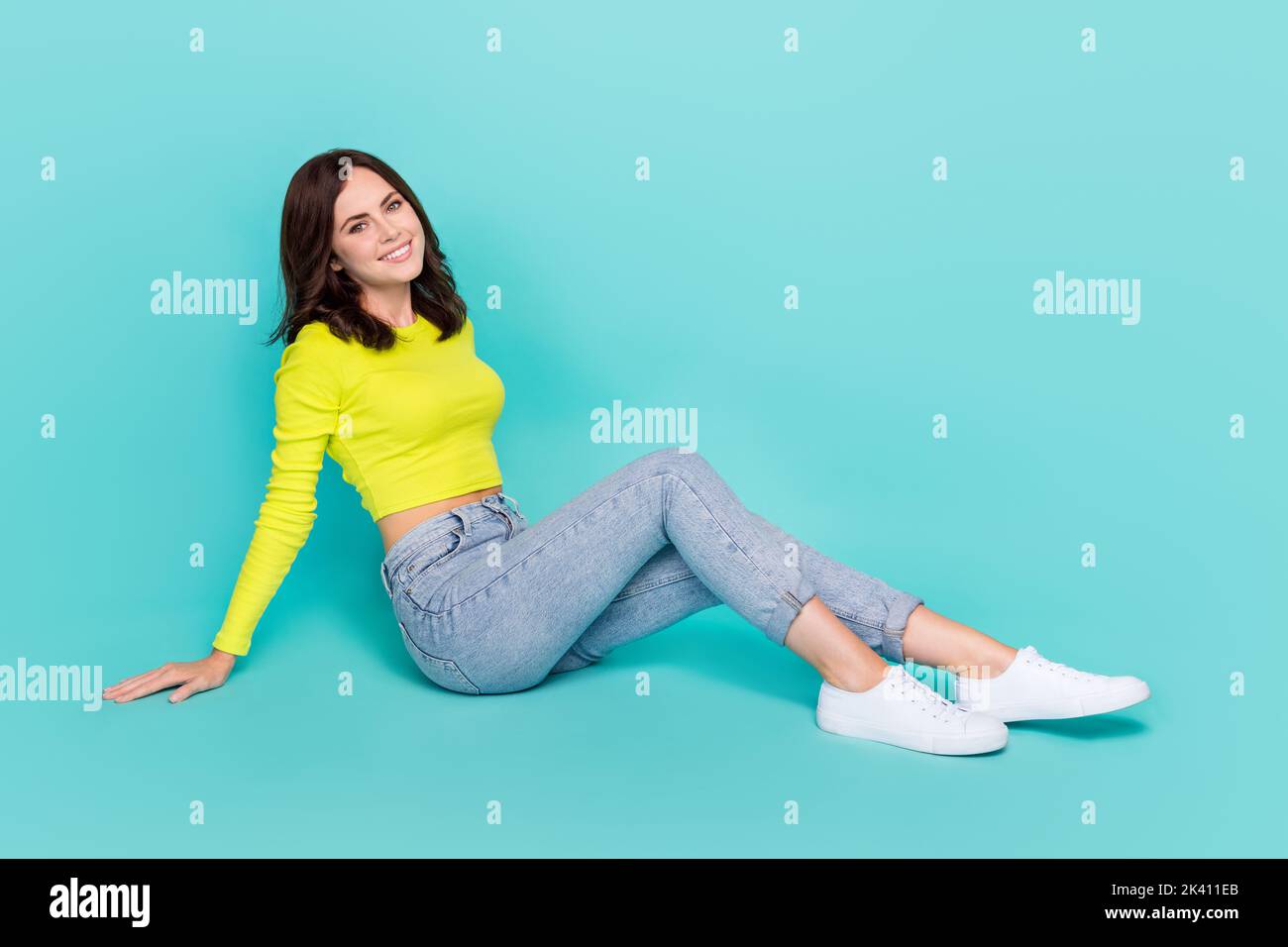 Full length profile photo of adorable cute person sit floor toothy ...