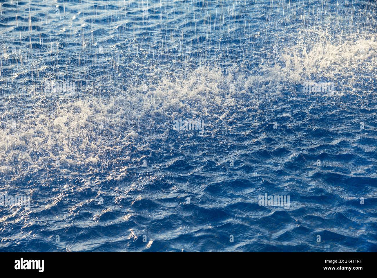 Heavy rain is falling into the swimming pool Stock Photo - Alamy