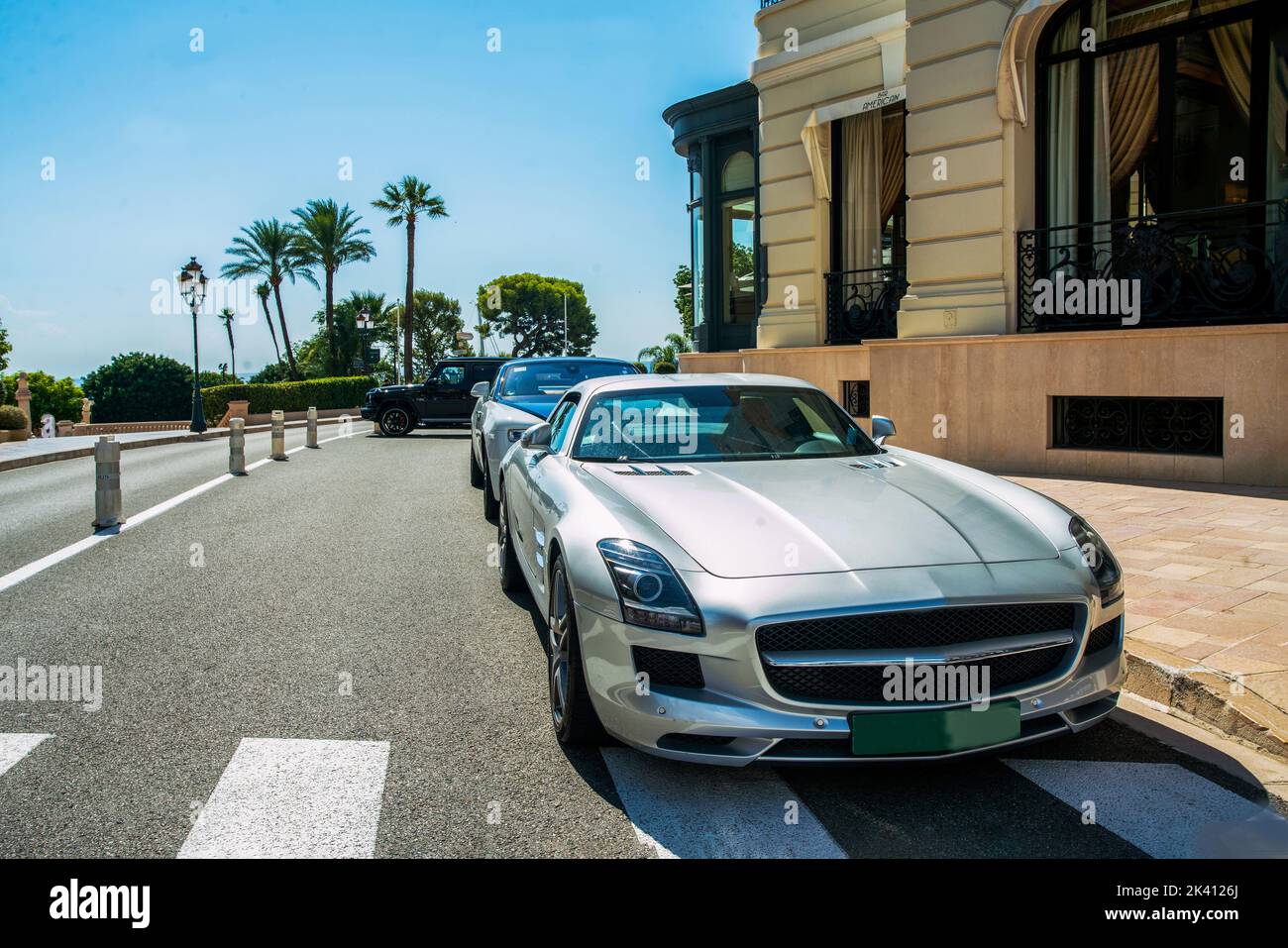 Sports car (coupe) in Monaco next to the famous Monte Carlo casinoand ...
