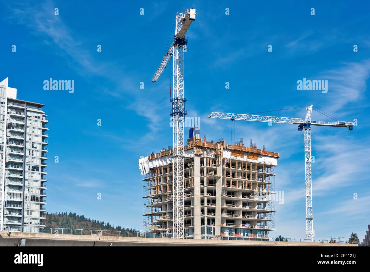 Residential building under constraction on blue sky background Stock ...