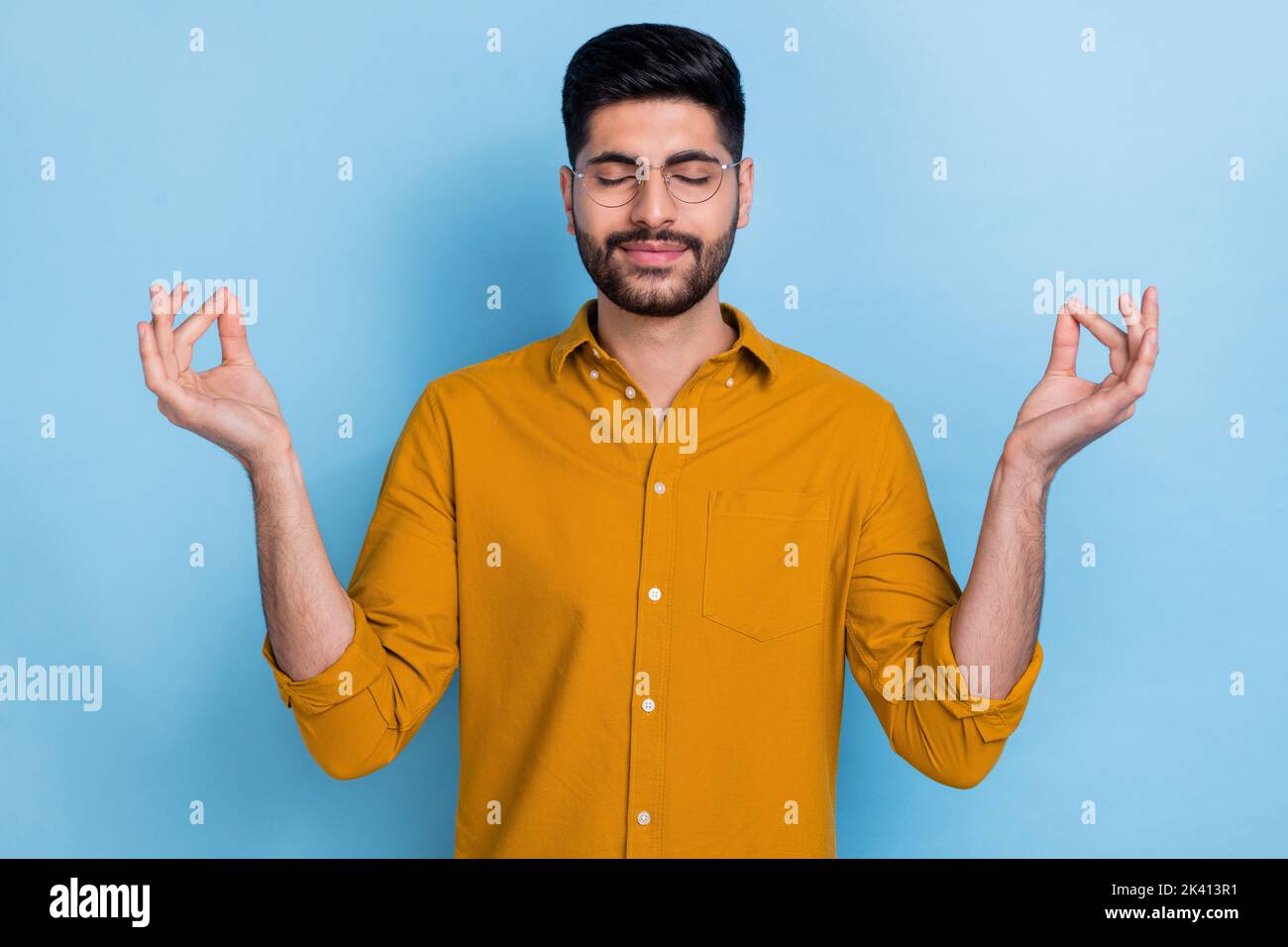 Photo of peaceful carefree handsome man dressed yellow shirt closed ...