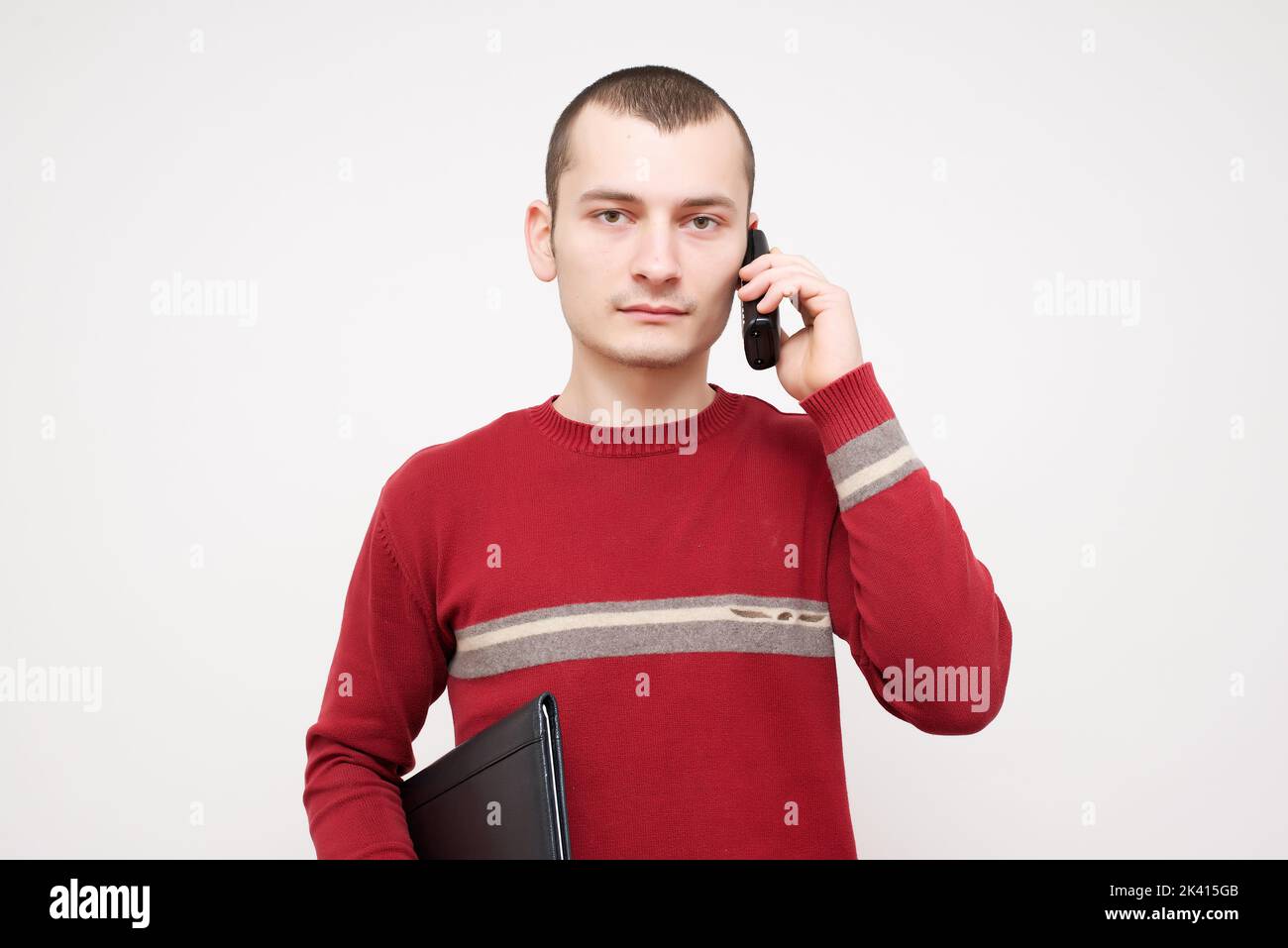 Young man calling stock photo Stock Photo - Alamy
