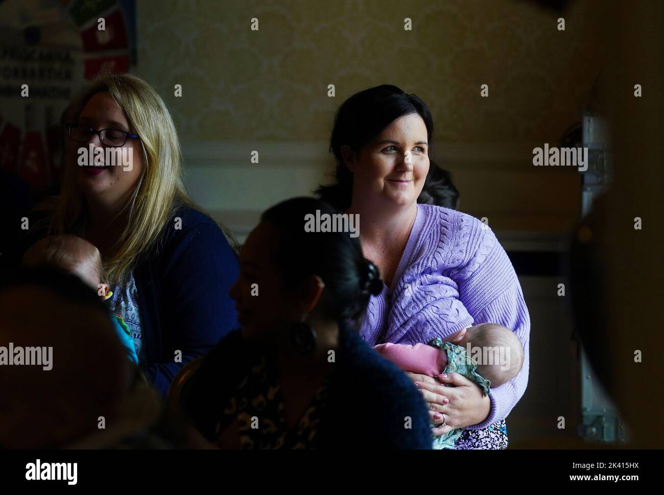 Aisling Moore (right) feeds her four month old daughter Allie King ...