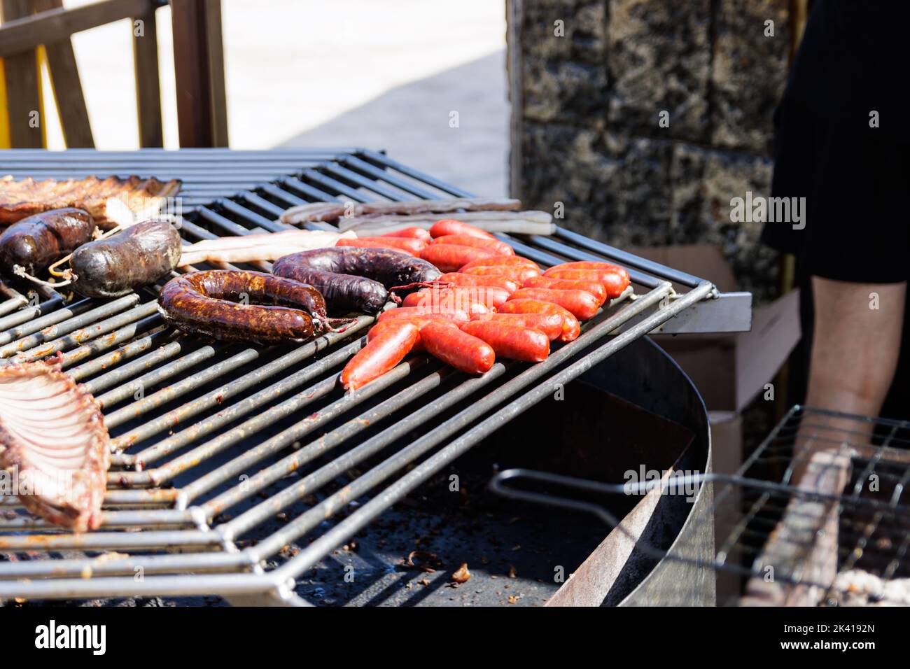 Grilled pork meat in medieval market Stock Photo - Alamy
