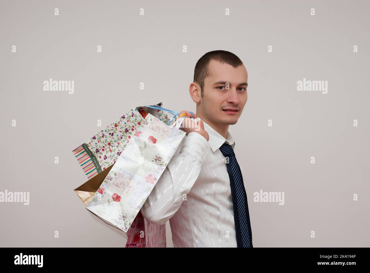 Happy male shopper - Stock Image Stock Photo - Alamy