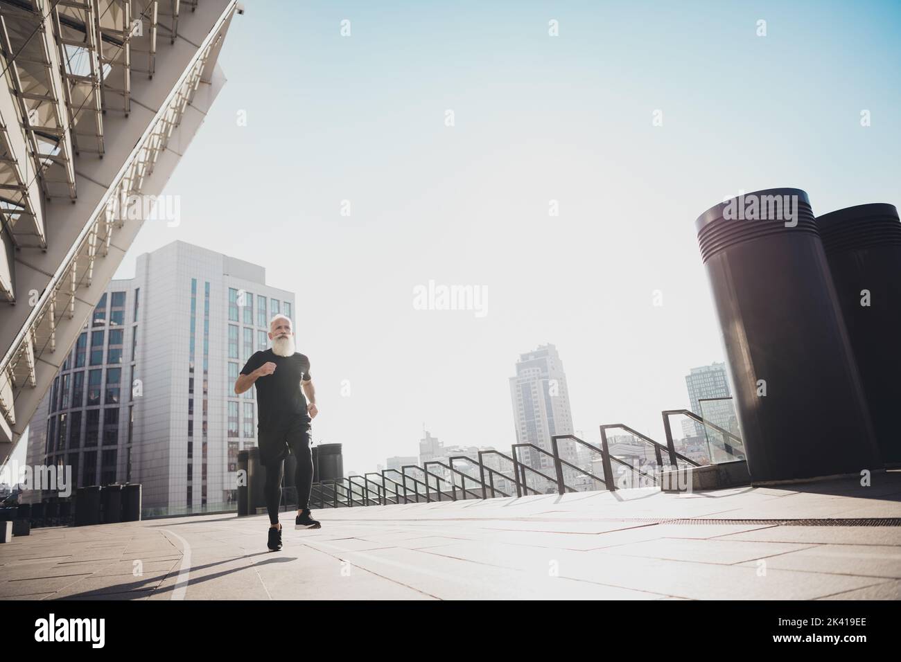 Photo of handsome pretty man pensioner dressed black clothes running ...