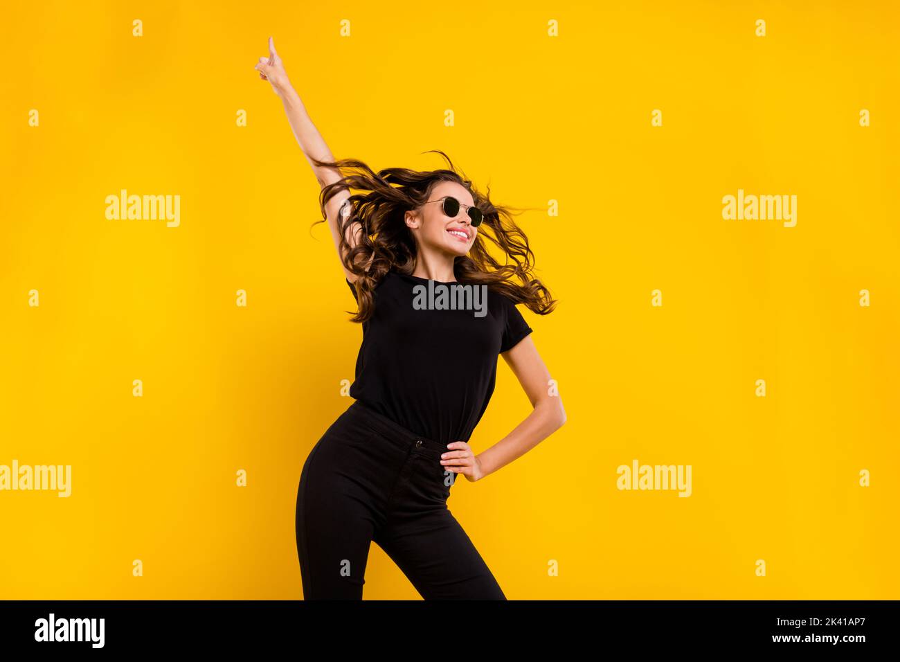 Photo of funky cool lady dressed black clothes dark eyewear wind ...