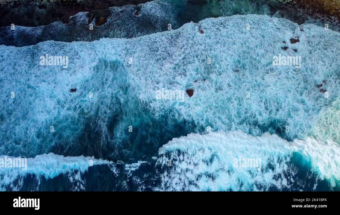 Beautiful texture of dark ocean waves with white foam. Drone filming ...