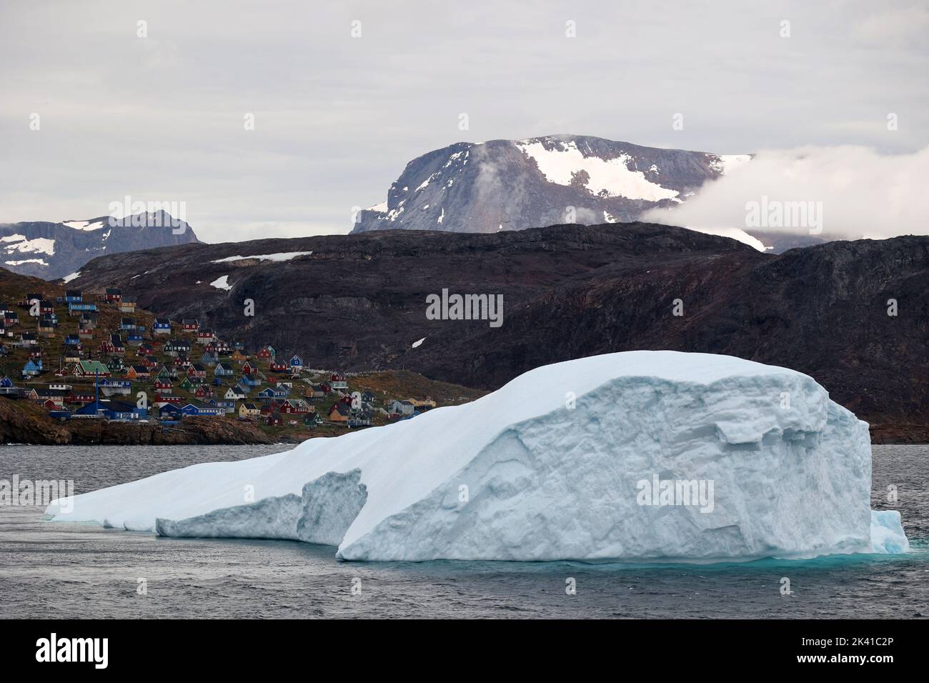 Coastal view with iceberg of Upernavik village, Greenland, Denmark ...