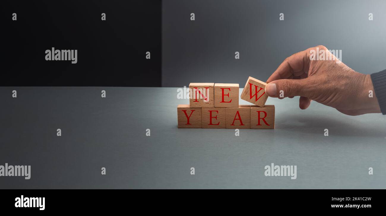 concept of the new year hand posing wooden blocks ,planning and ...