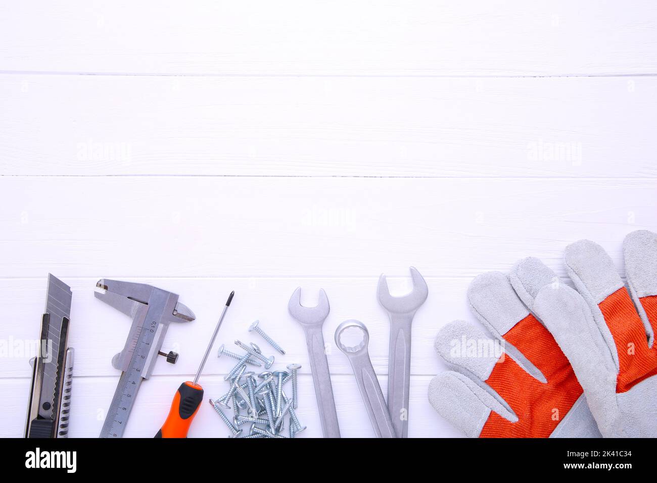 Different construction tools on wooden background with copy space Stock ...