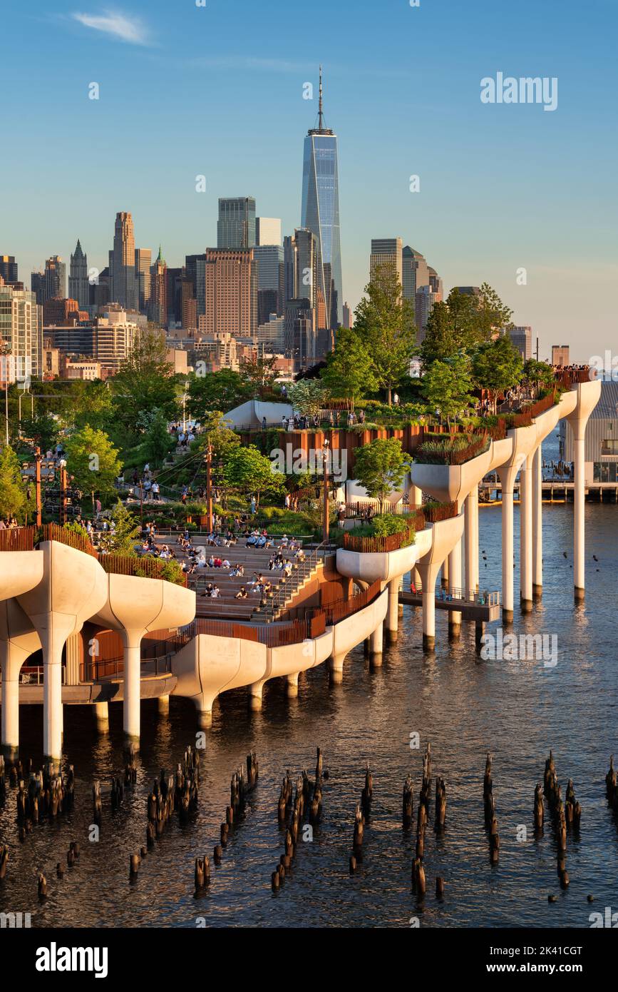 New York City, Little Island public park with view of the World Trade Center. Elevated park at ...