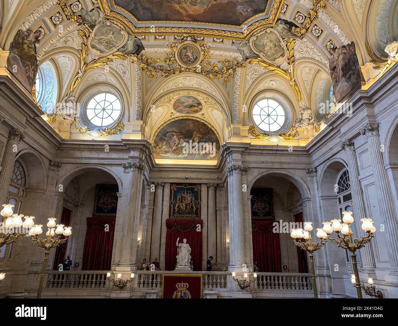 Spain, Madrid. Royal Palace. Tourists in Main Entrance Hall Stock Photo ...