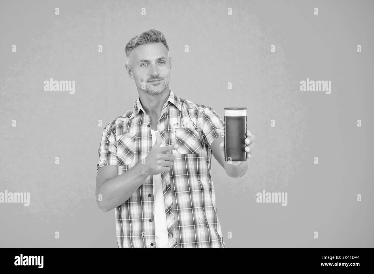 To feel great all day long. Man pointing at gel bottle. Pointing finger ...