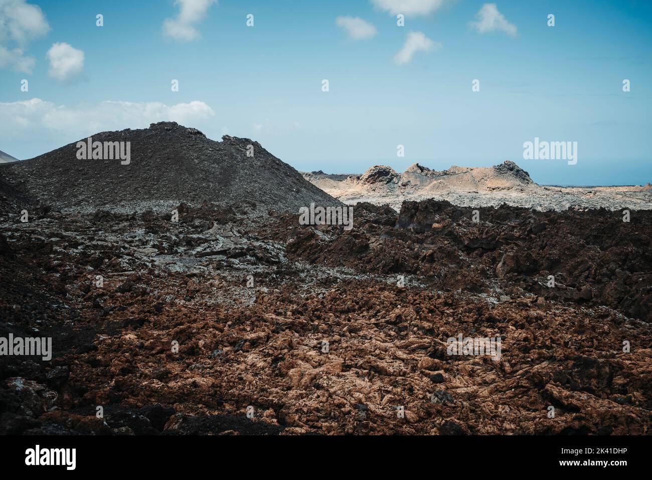 Amazing volcanic landscape with lava fields in Timanfaya National Park ...