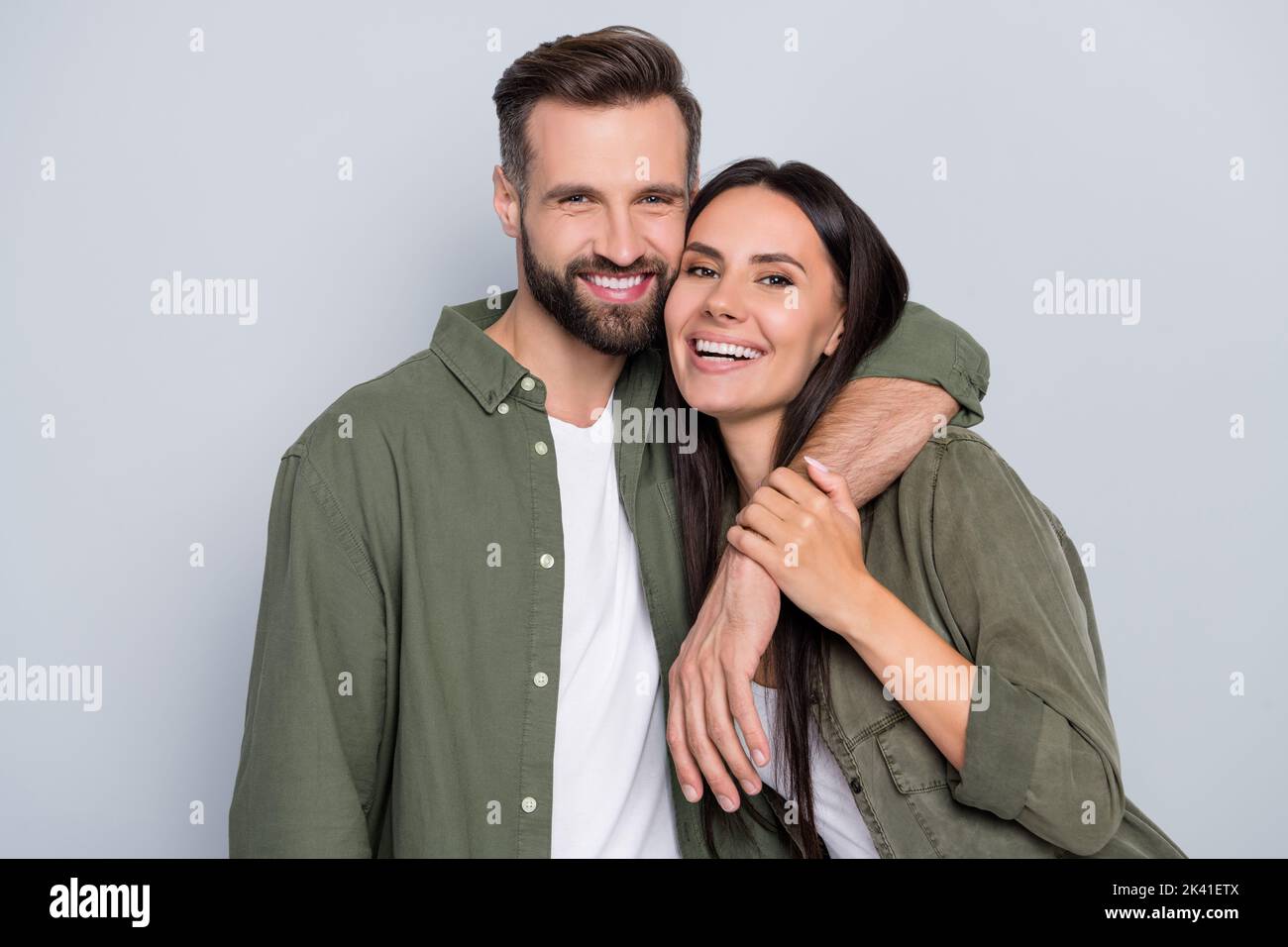Portrait of attractive tender sweet cheerful couple cuddling romance ...