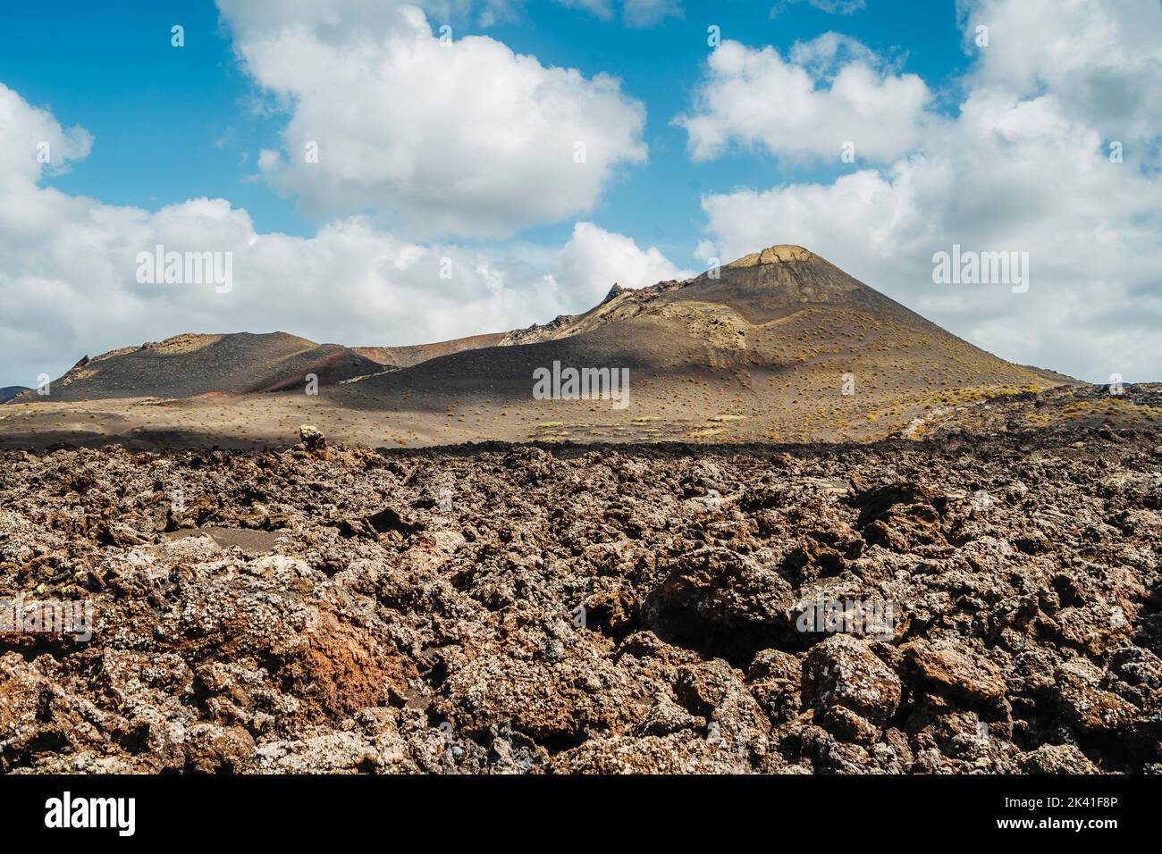 Amazing volcanic landscape with lava fields in Timanfaya National Park ...