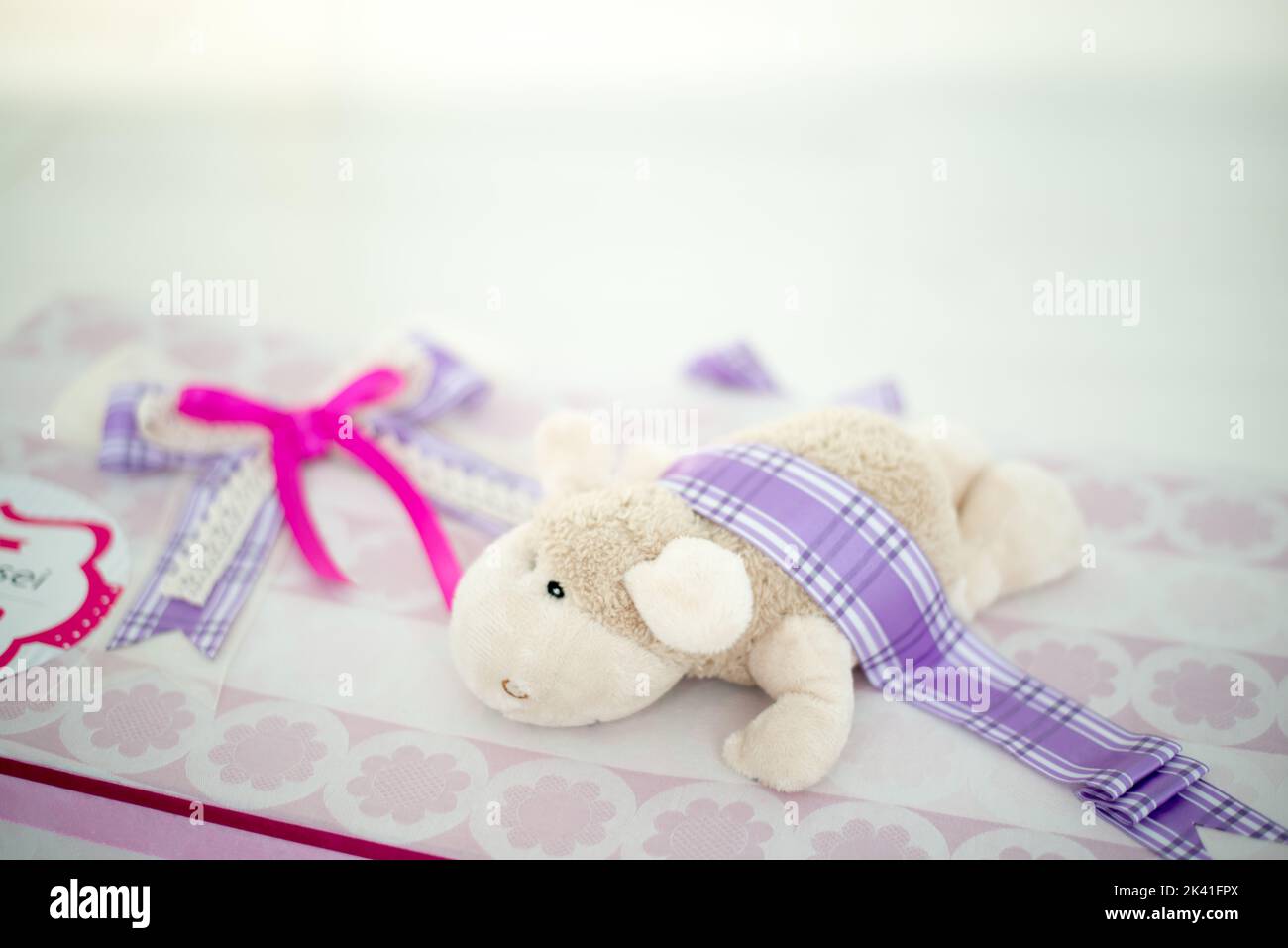 Gift box with small sheep Stock Photo - Alamy