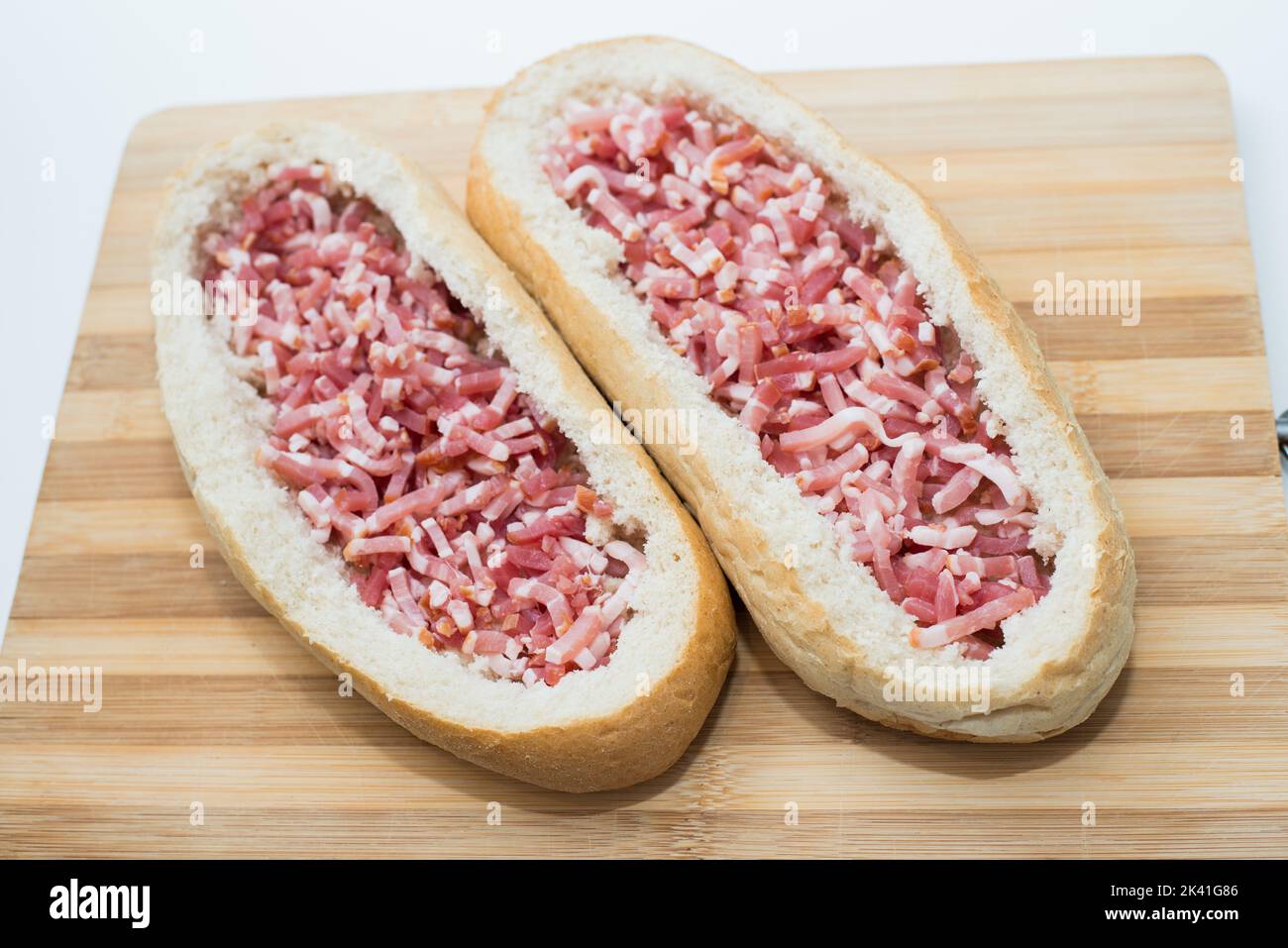 Oval bread with bacon Stock Photo - Alamy