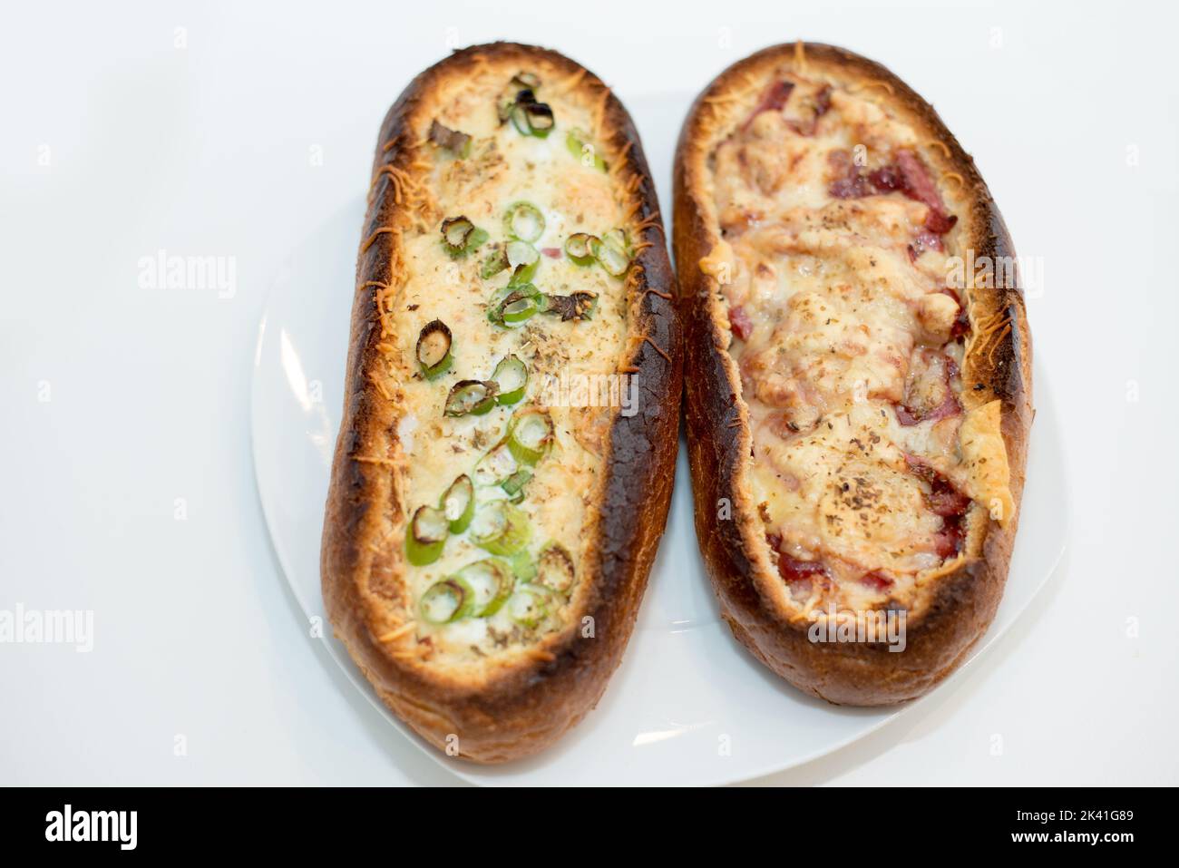 Hot snacks with onion and bacon Stock Photo - Alamy