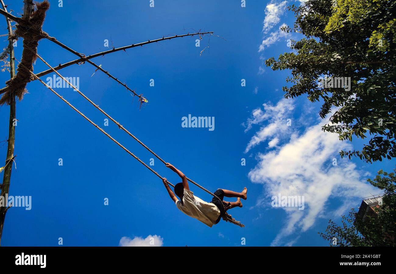 Kathmandu, Bagmati, Nepal. 29th Sep, 2022. A boy plays on a traditional ... Kathmandu, Bagmati, Nepal. 29th Sep, 2022. A boy plays on a traditional ...