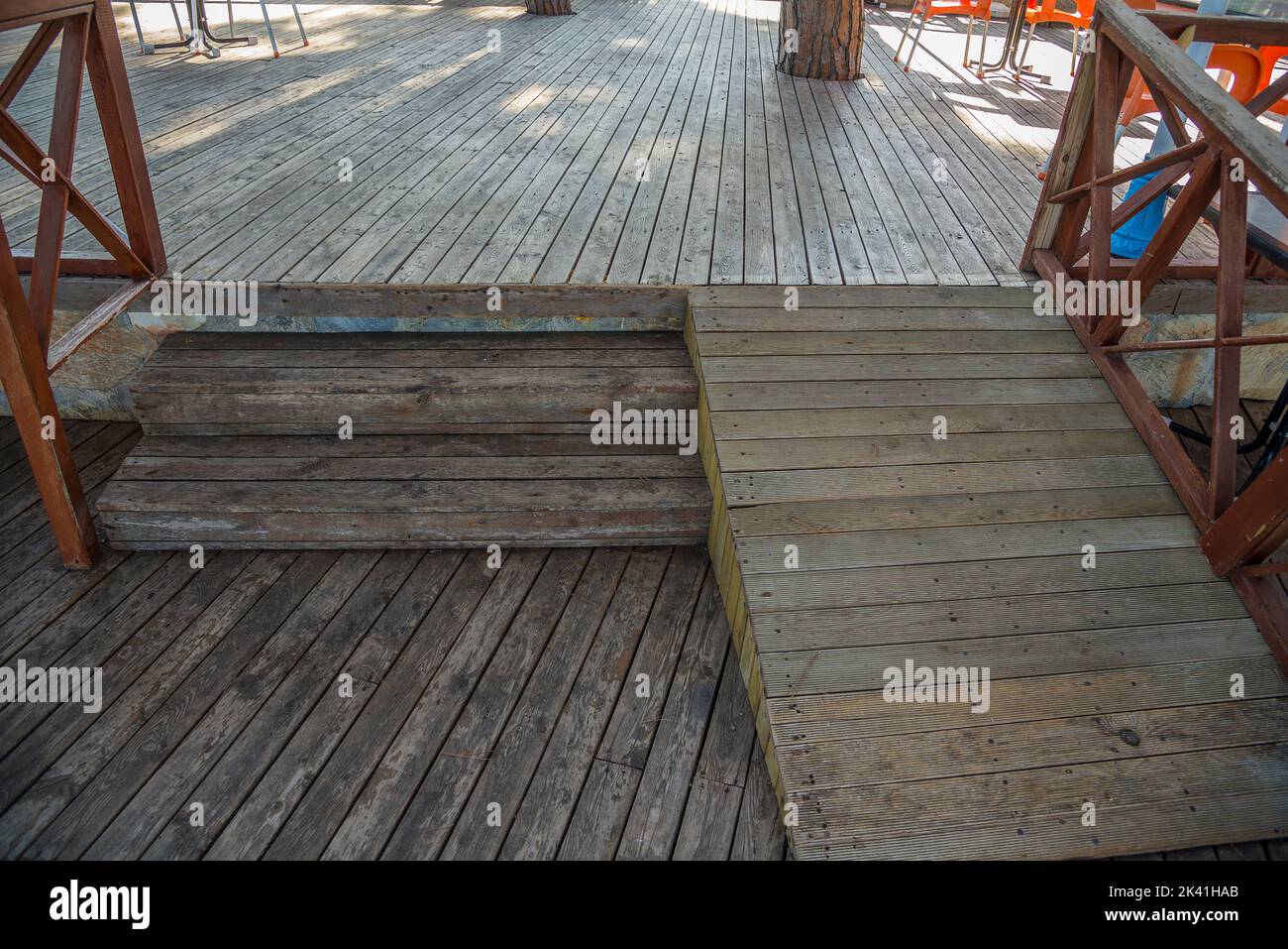 Wooden ramped access, using wheelchair ramp for disabled people Stock ...