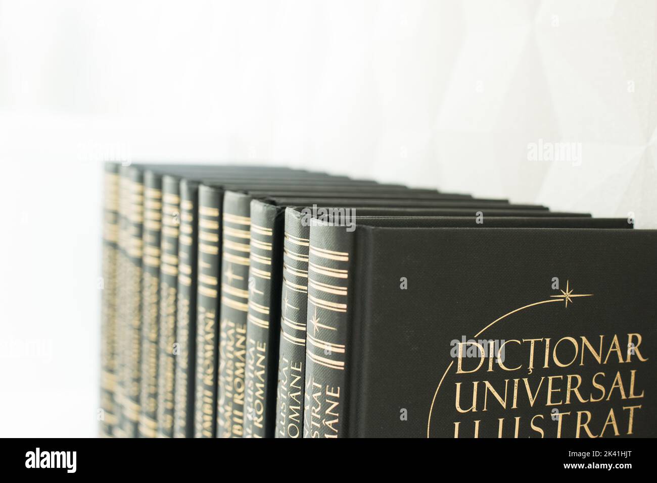 Row of books on bookshelf Stock Photo - Alamy