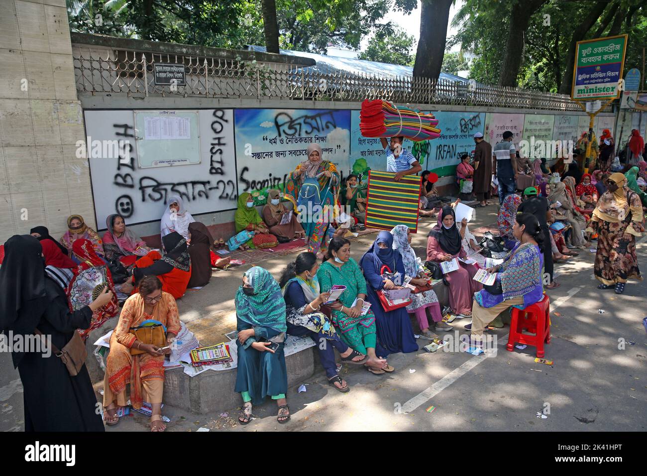 Some footage of parents of candidates waiting patiently outside the SSC ...