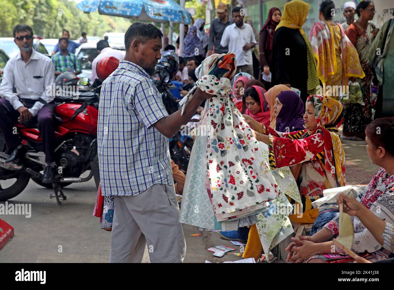 Some footage of parents of candidates waiting patiently outside the SSC ...