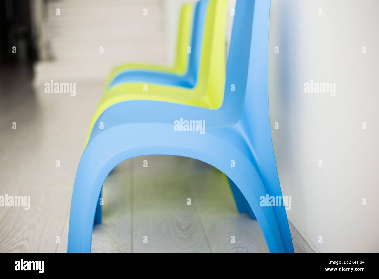 Blue plastic chair Stock Photo - Alamy