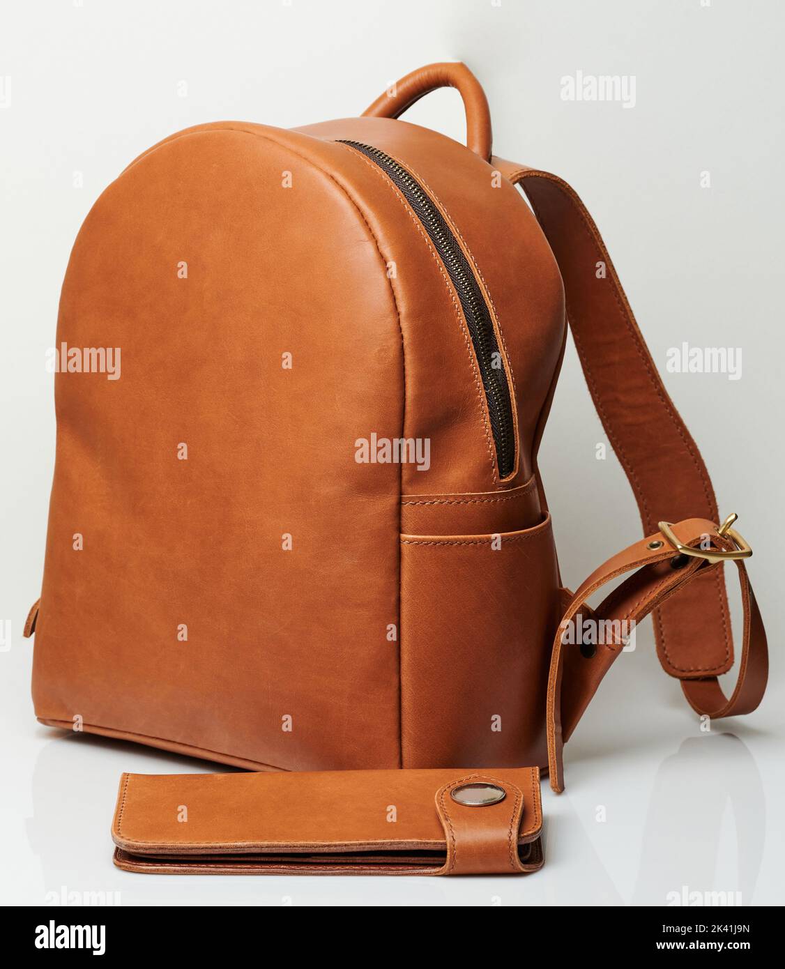 Simple brown leather bags isolated on studio background Stock Photo - Alamy