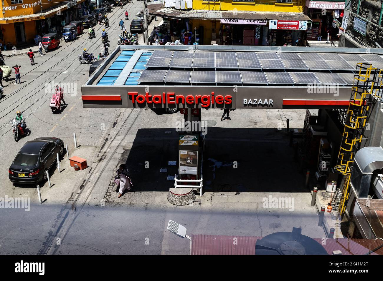 Solar panels are seen on the roof of Total Energies Gas Station in ...