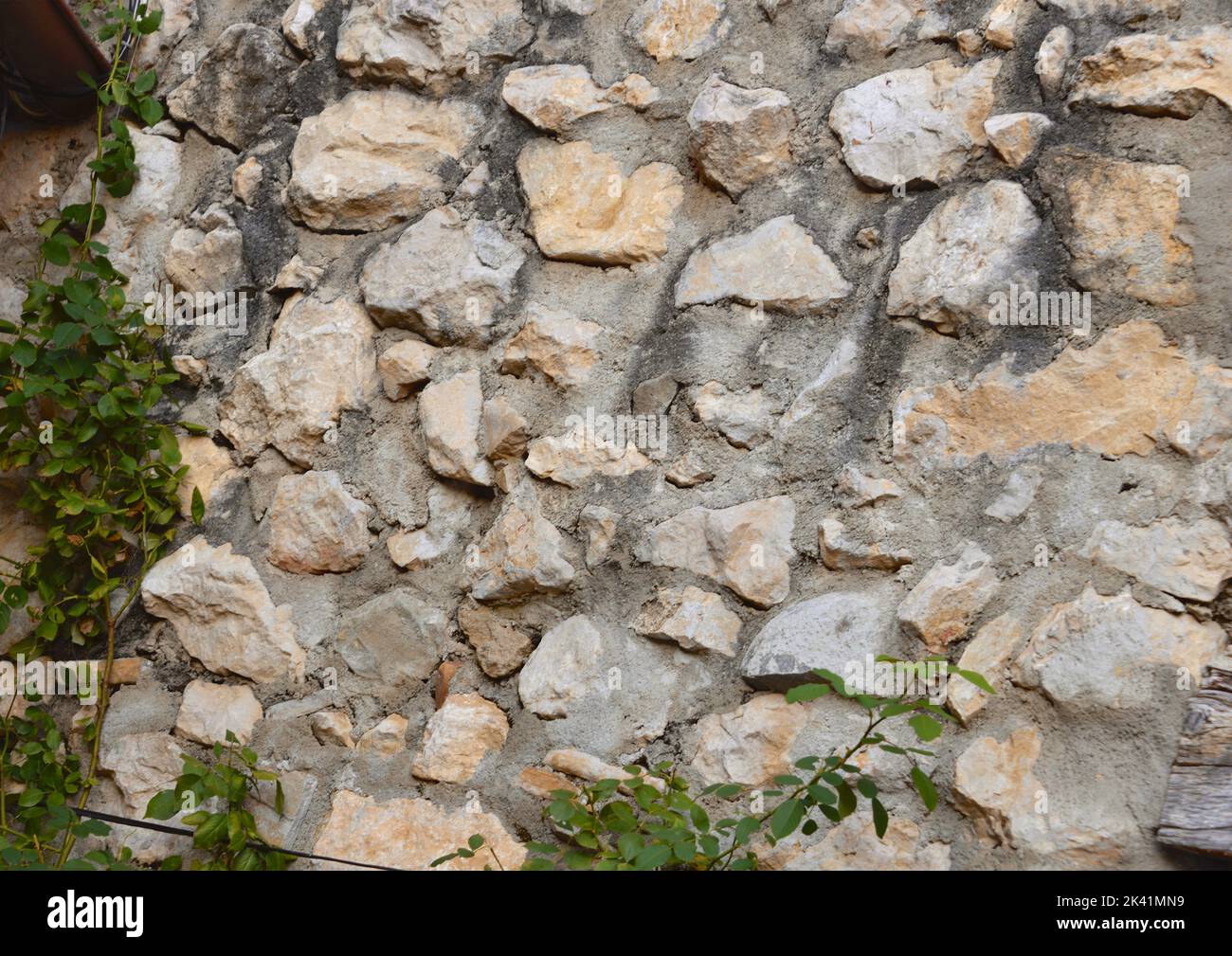 Natural stone wall texture Stock Photo - Alamy