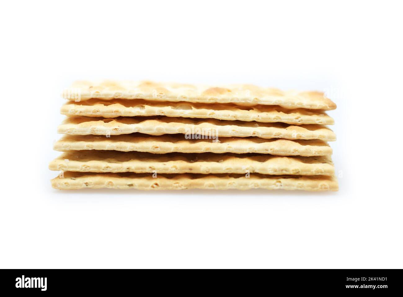Stack of salty crackers on white background Stock Photo - Alamy