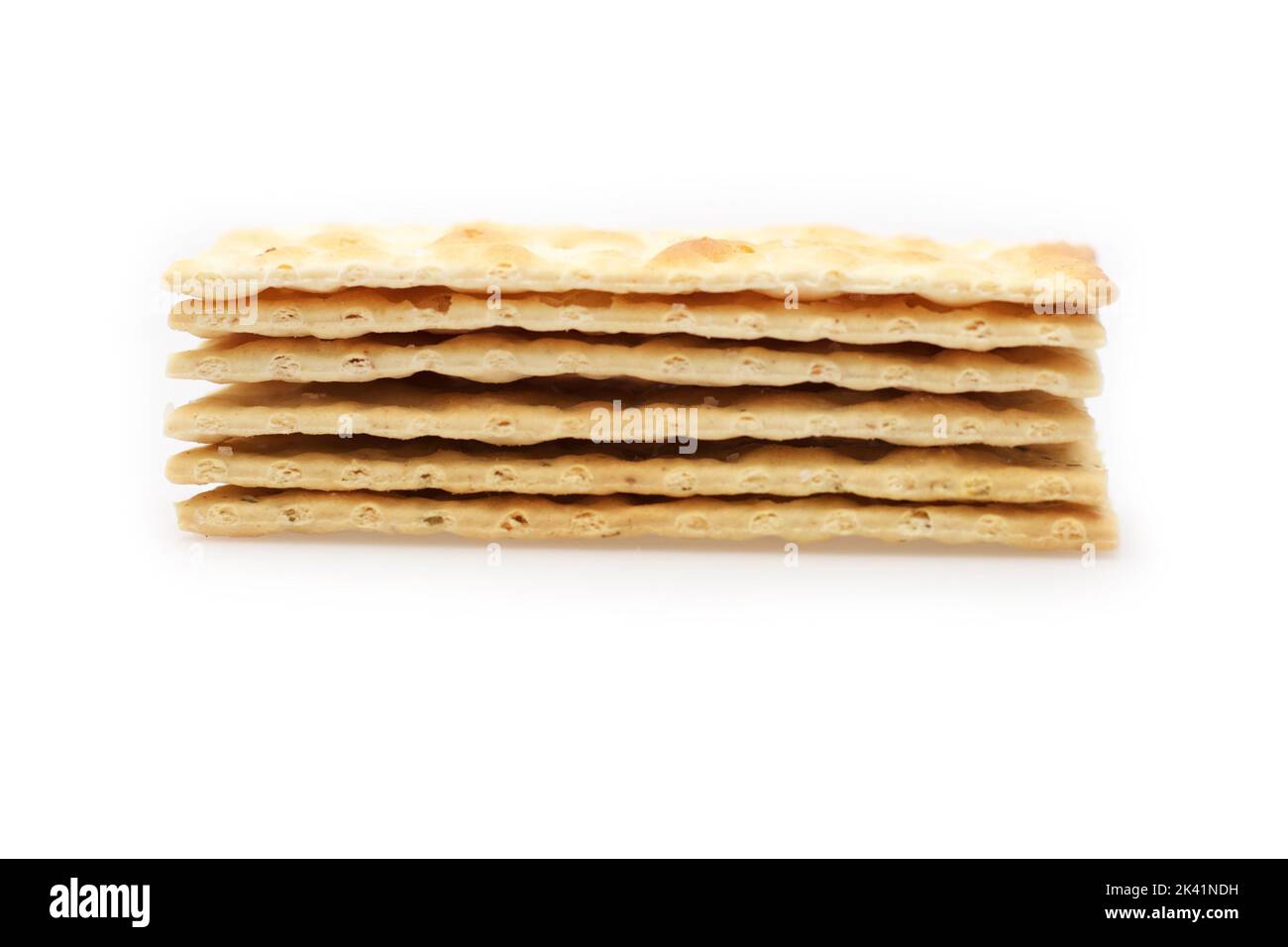 Salty cracker isolated on white Stock Photo - Alamy