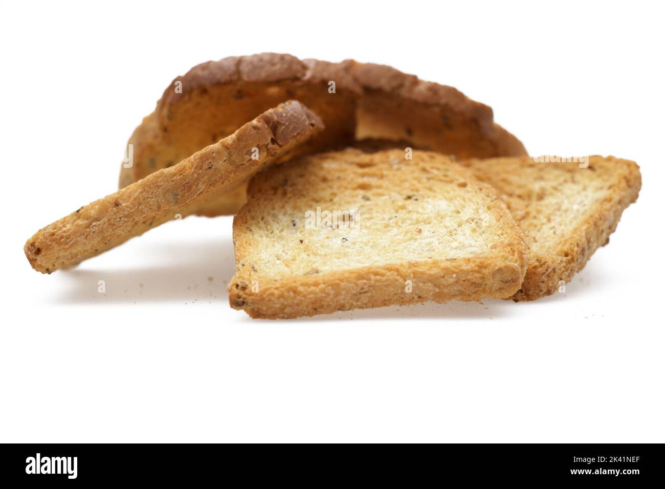 Toasted bread slices isolated over white Stock Photo - Alamy