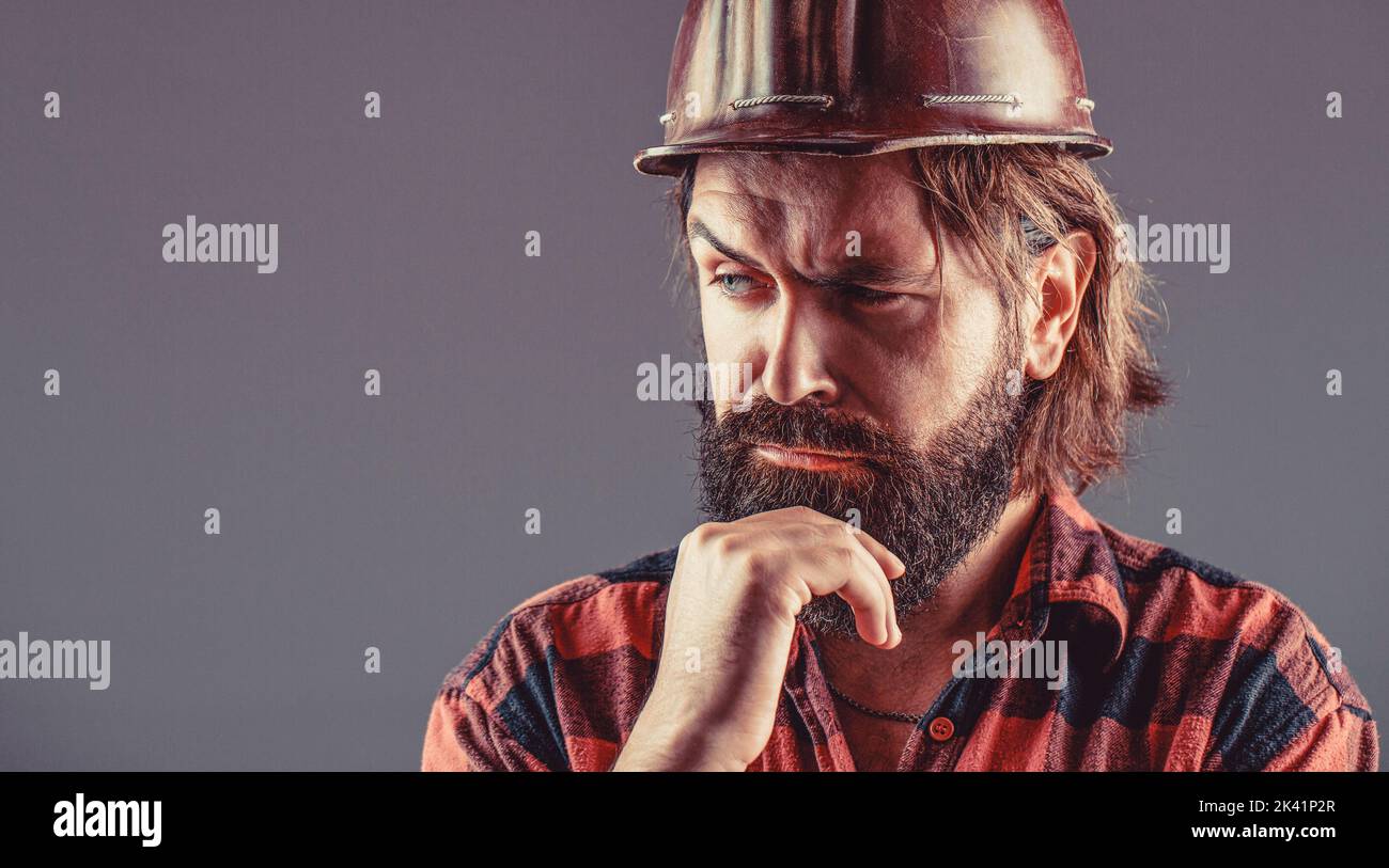 Builder in hard hat, foreman or repairman in the helmet. Building ...