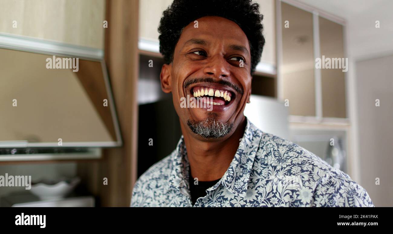African man laughing , real life laugh Stock Photo - Alamy