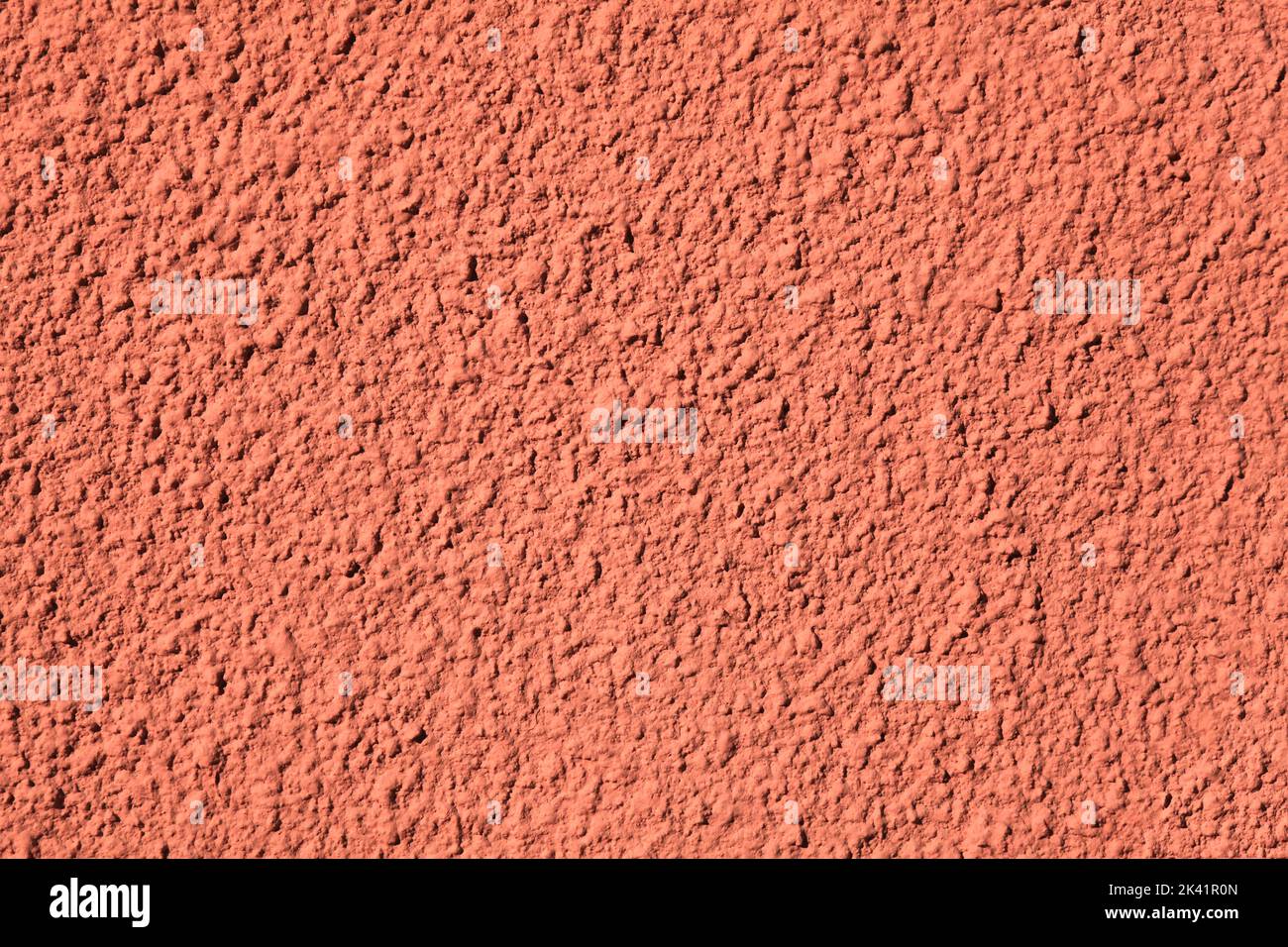 Pink wall, texture, background. Relief surface. Plastered building wall ...