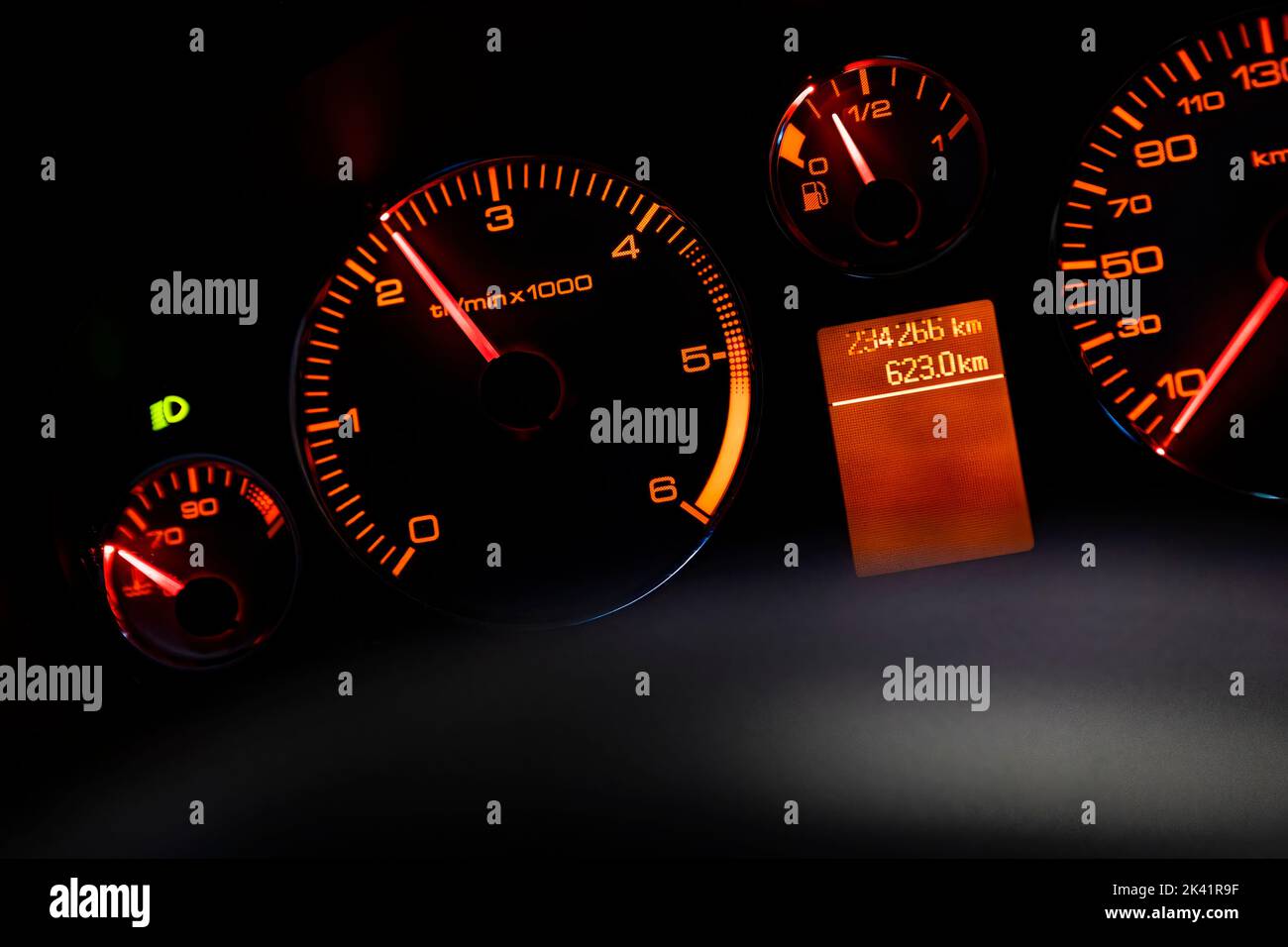 Red Car Tachometer in the dark. Symbol of speed. Dashboard with ...