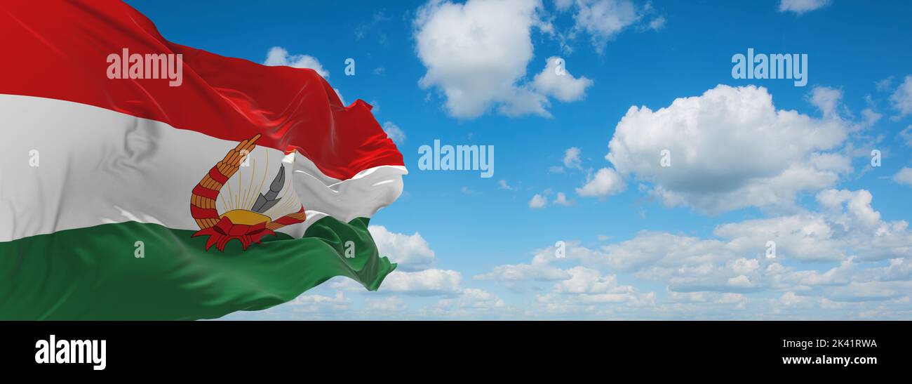 flag of Republic of Mahabad, asia at cloudy sky background, panoramic ...