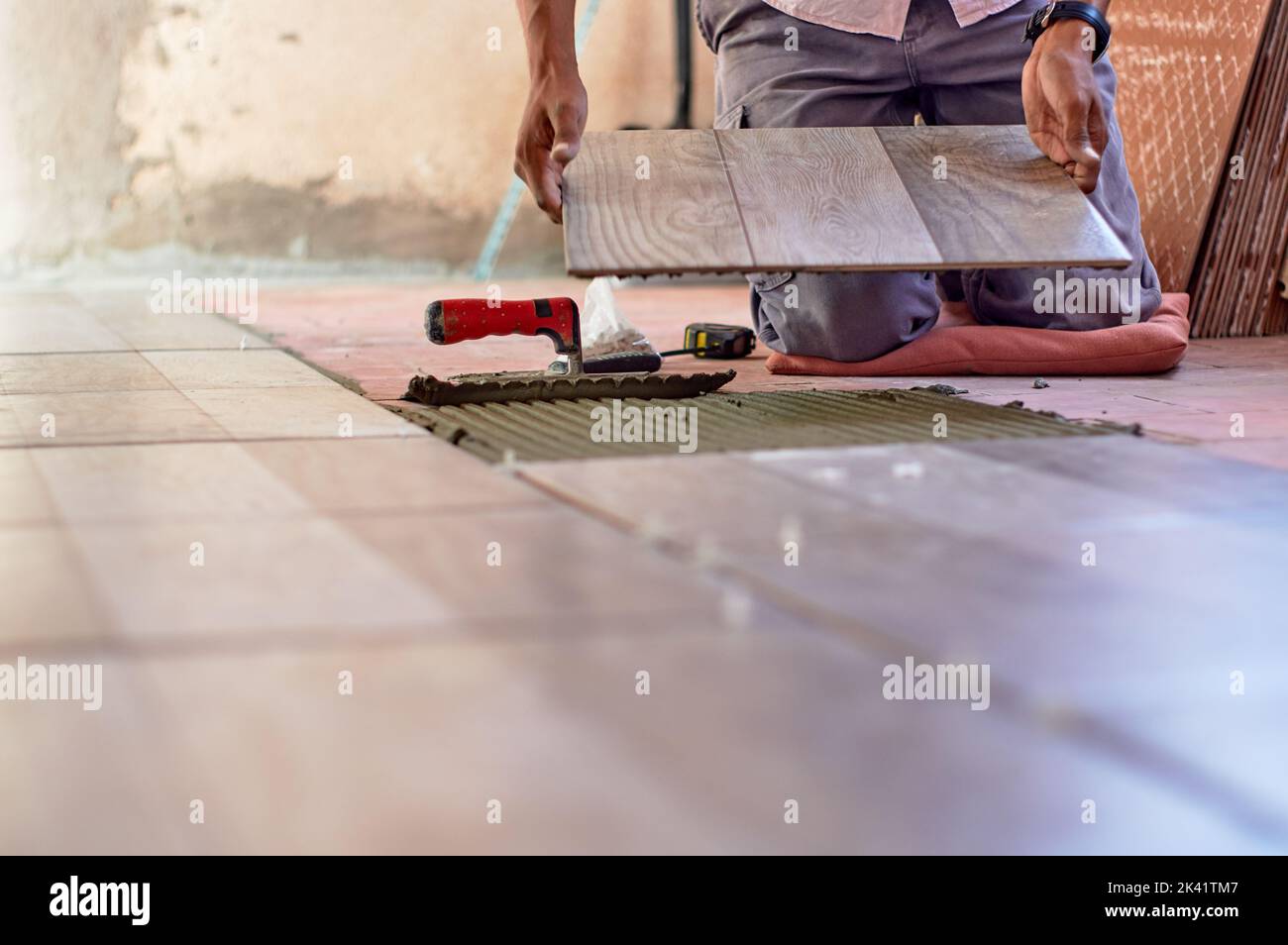 Installing ceramic floors hi-res stock photography and images - Alamy