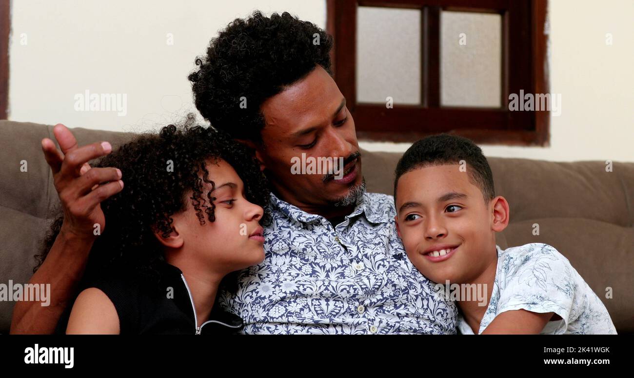 African father speaking with children giving parenting guidance Stock Photo - Alamy