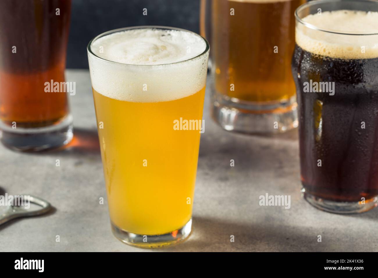 Cold Refreshing Assorted Craft Beers in Different Mugs Stock Photo - Alamy