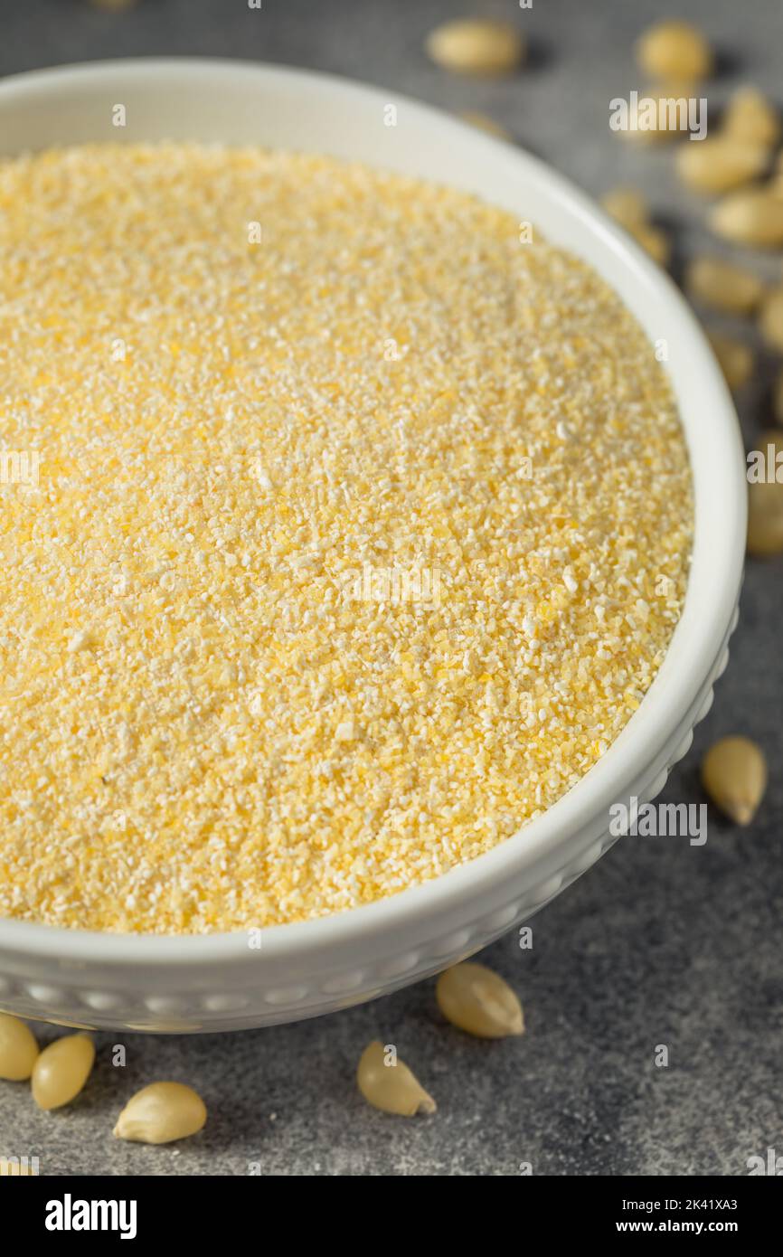 Raw Dry Organic Instant Polenta in a Bowl Stock Photo - Alamy