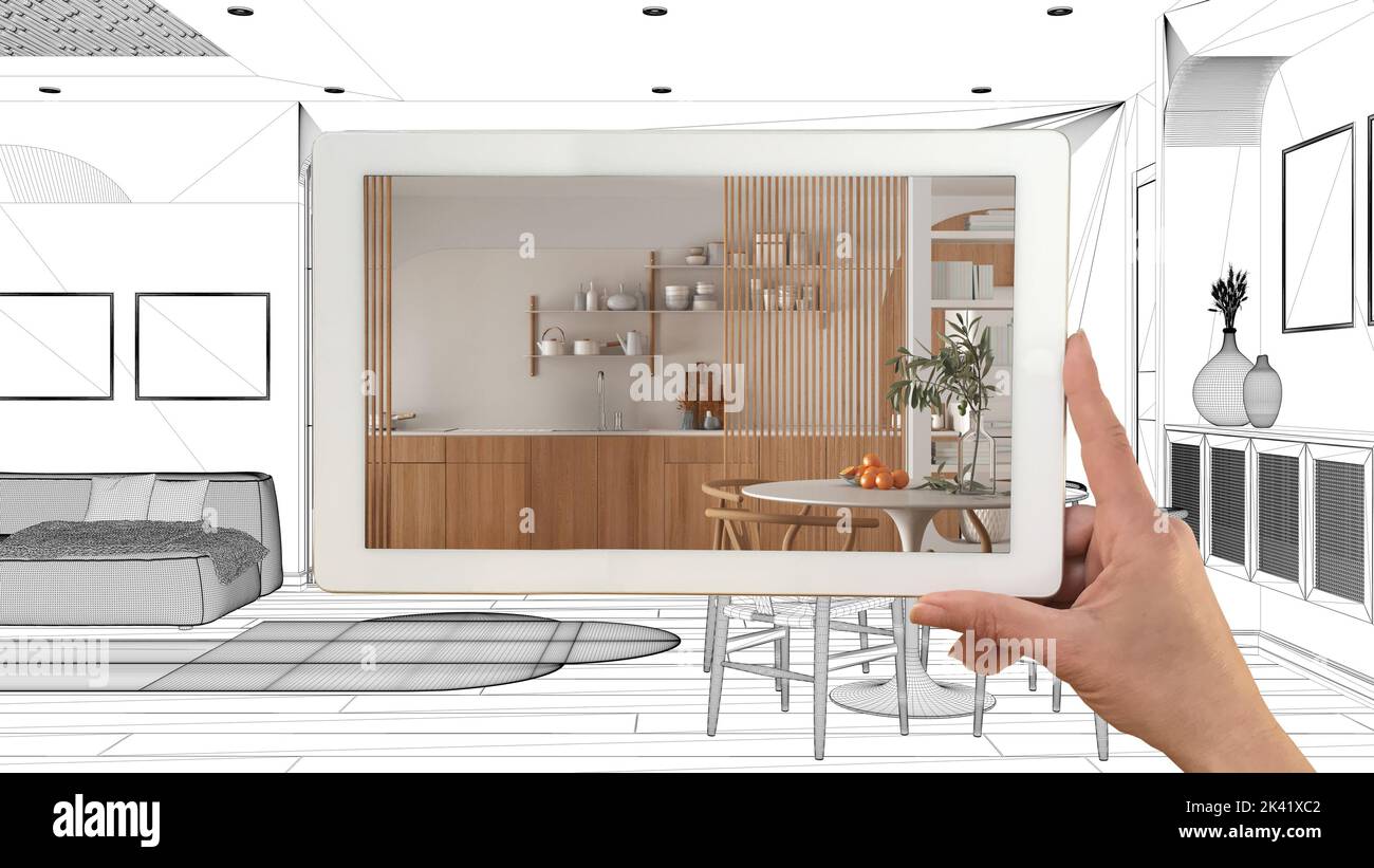 Augmented reality concept. Hand holding tablet with AR application used ...