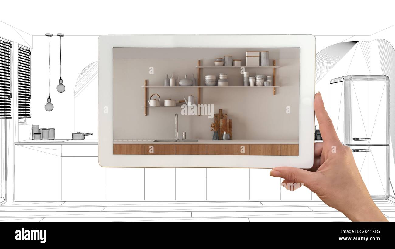 Augmented reality concept. Hand holding tablet with AR application used ...