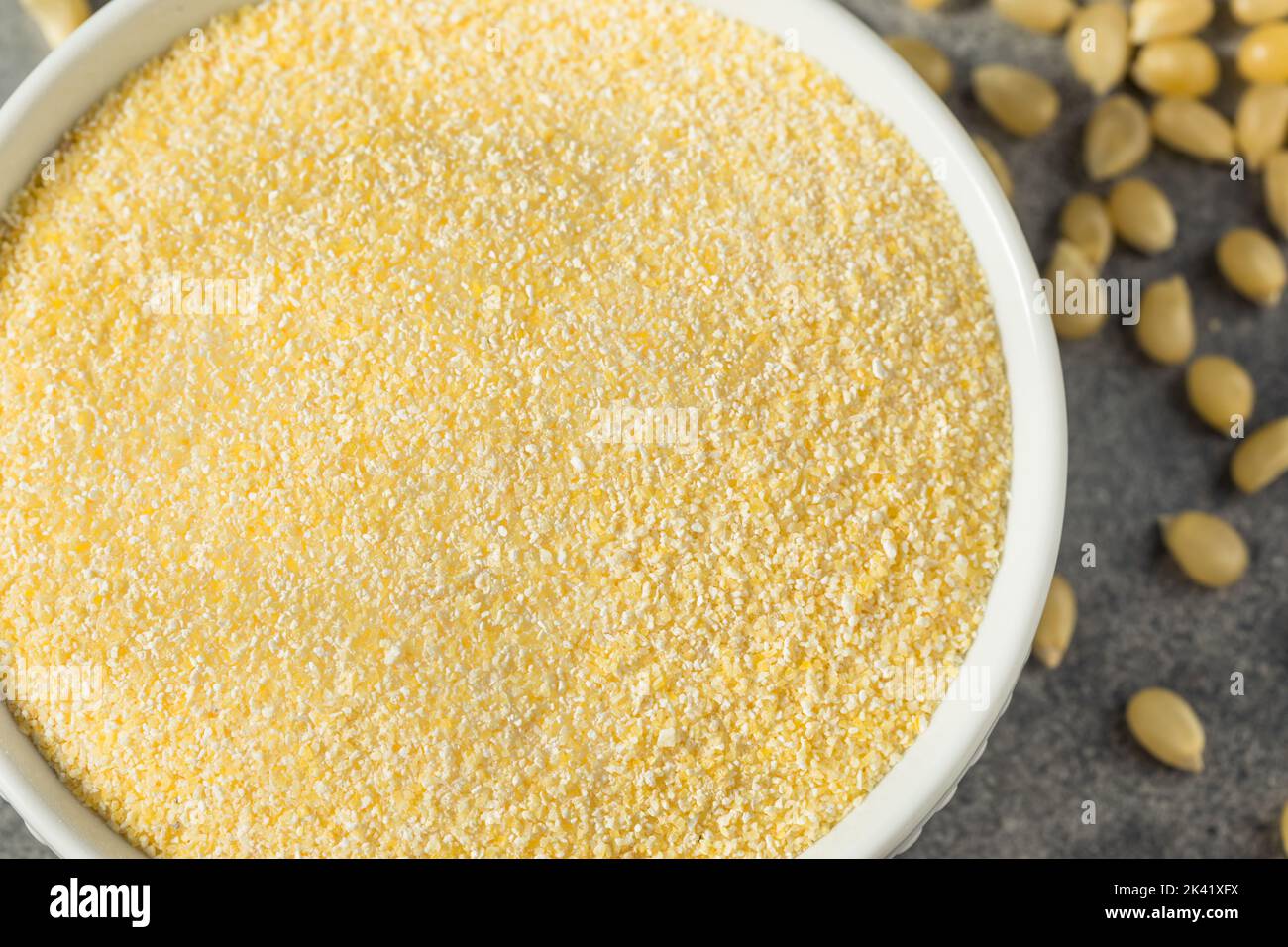Raw Dry Organic Instant Polenta in a Bowl Stock Photo - Alamy