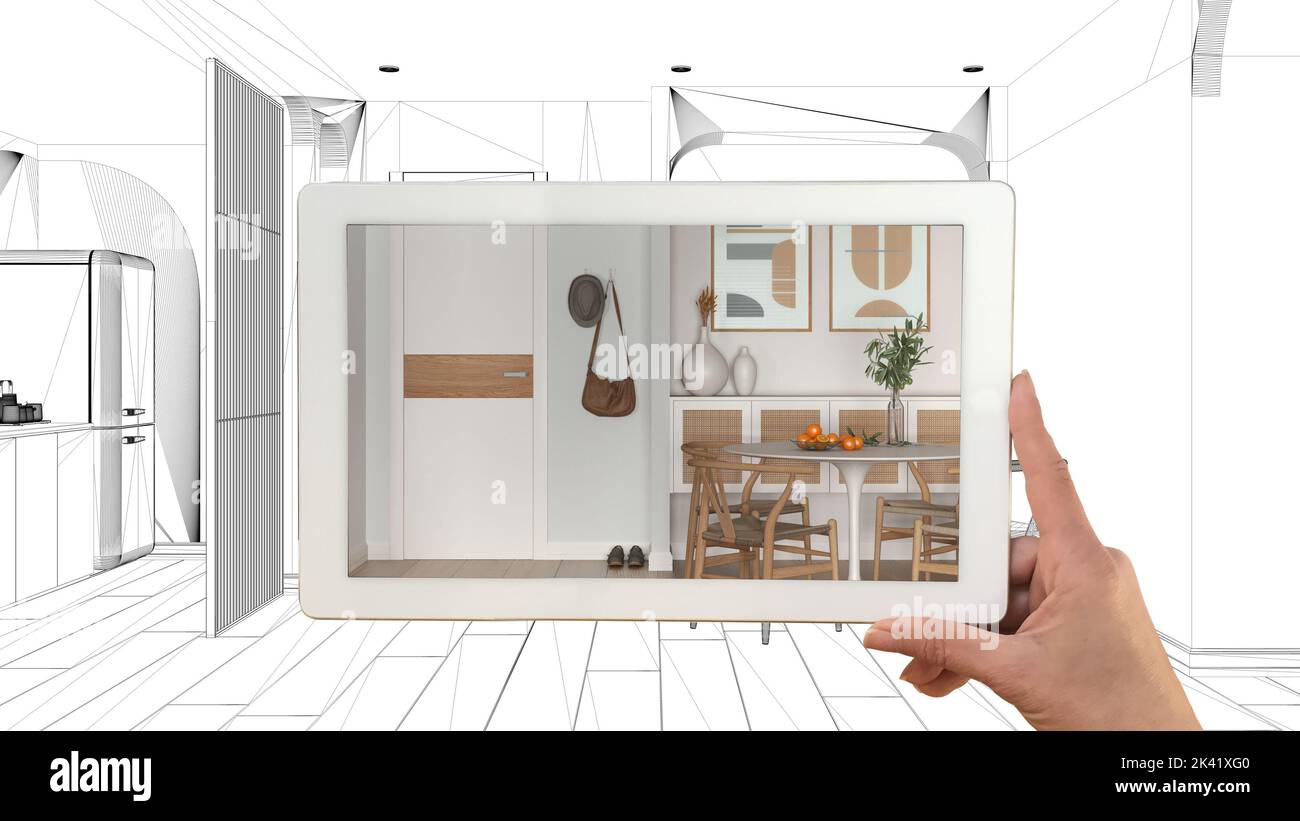 Augmented reality concept. Hand holding tablet with AR application used ...