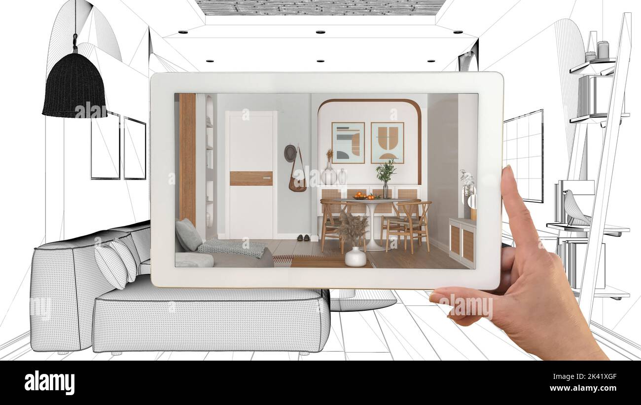 Augmented reality concept. Hand holding tablet with AR application used ...